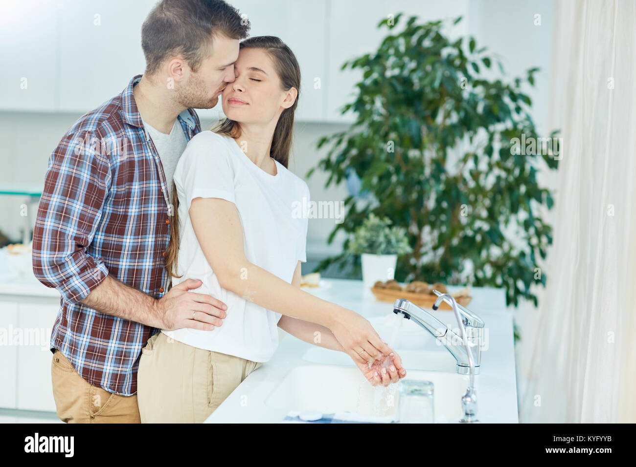 Love in the kitchen Stock Photo - Alamy