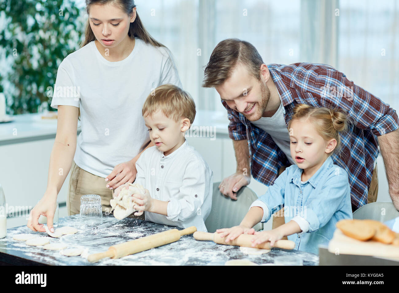 Cooking pastry together Stock Photo - Alamy