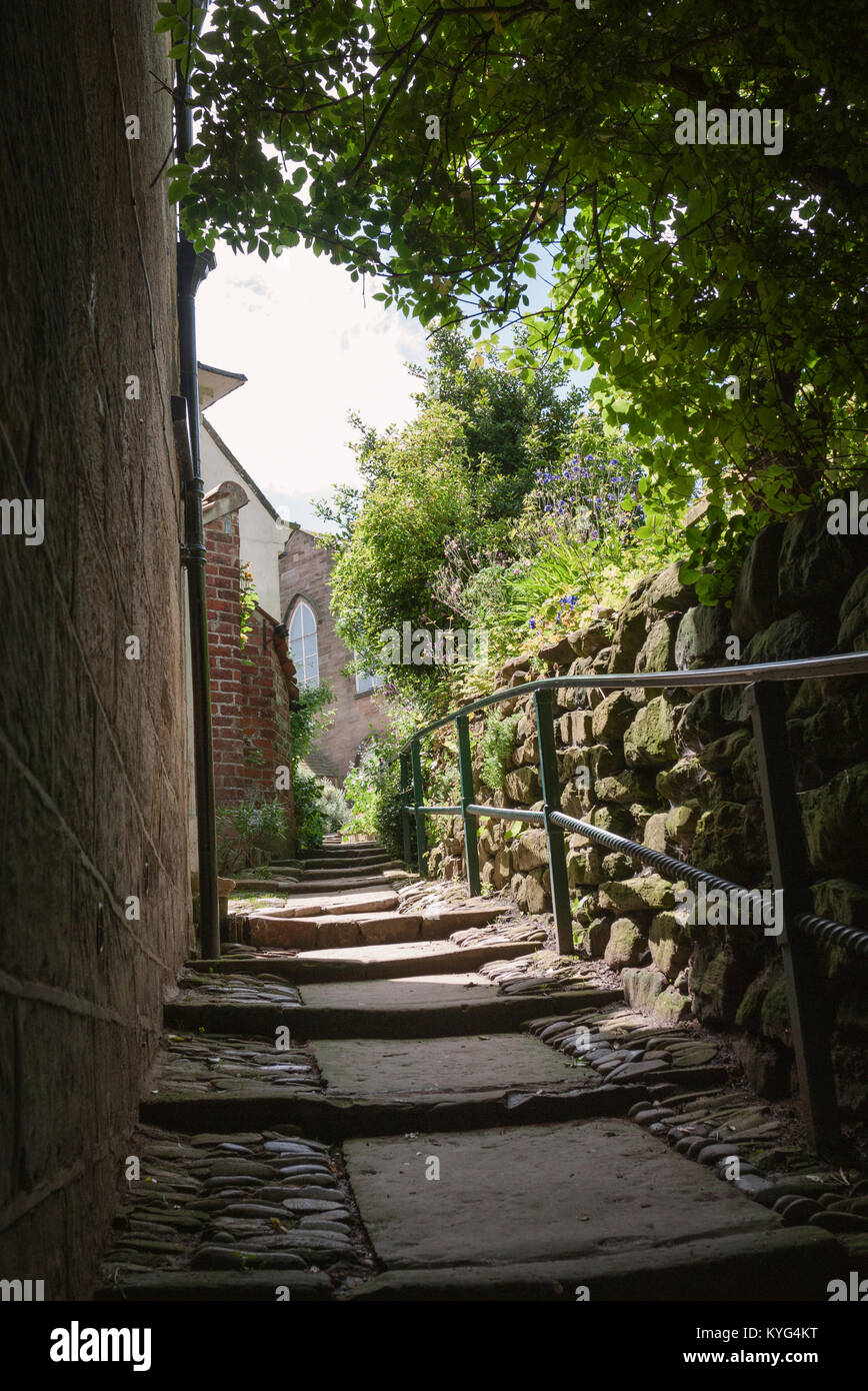 A small side street running round the back of cottages leading up to ...