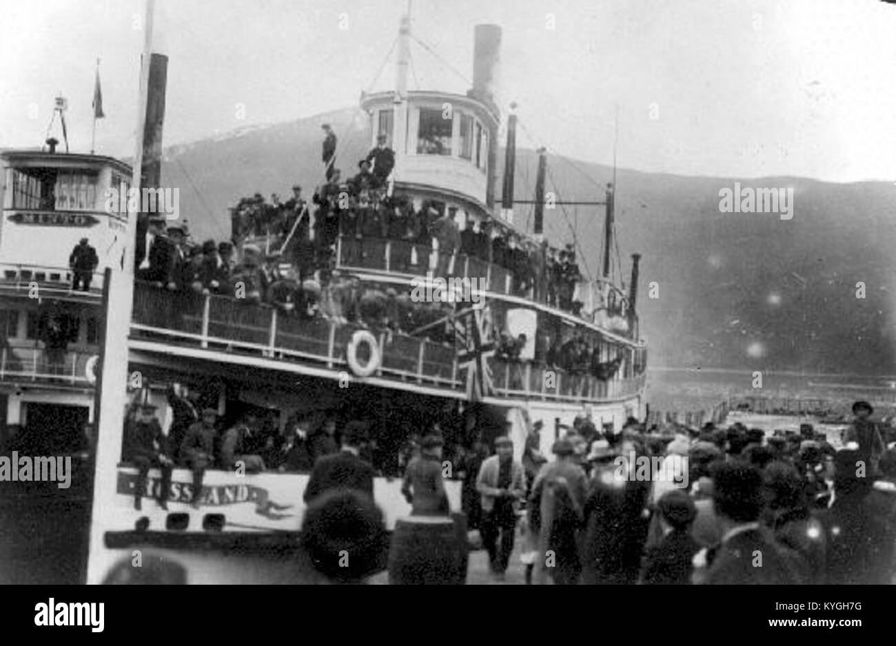 The image shows the sternwheeler Rossland loading troops around 1915 ...