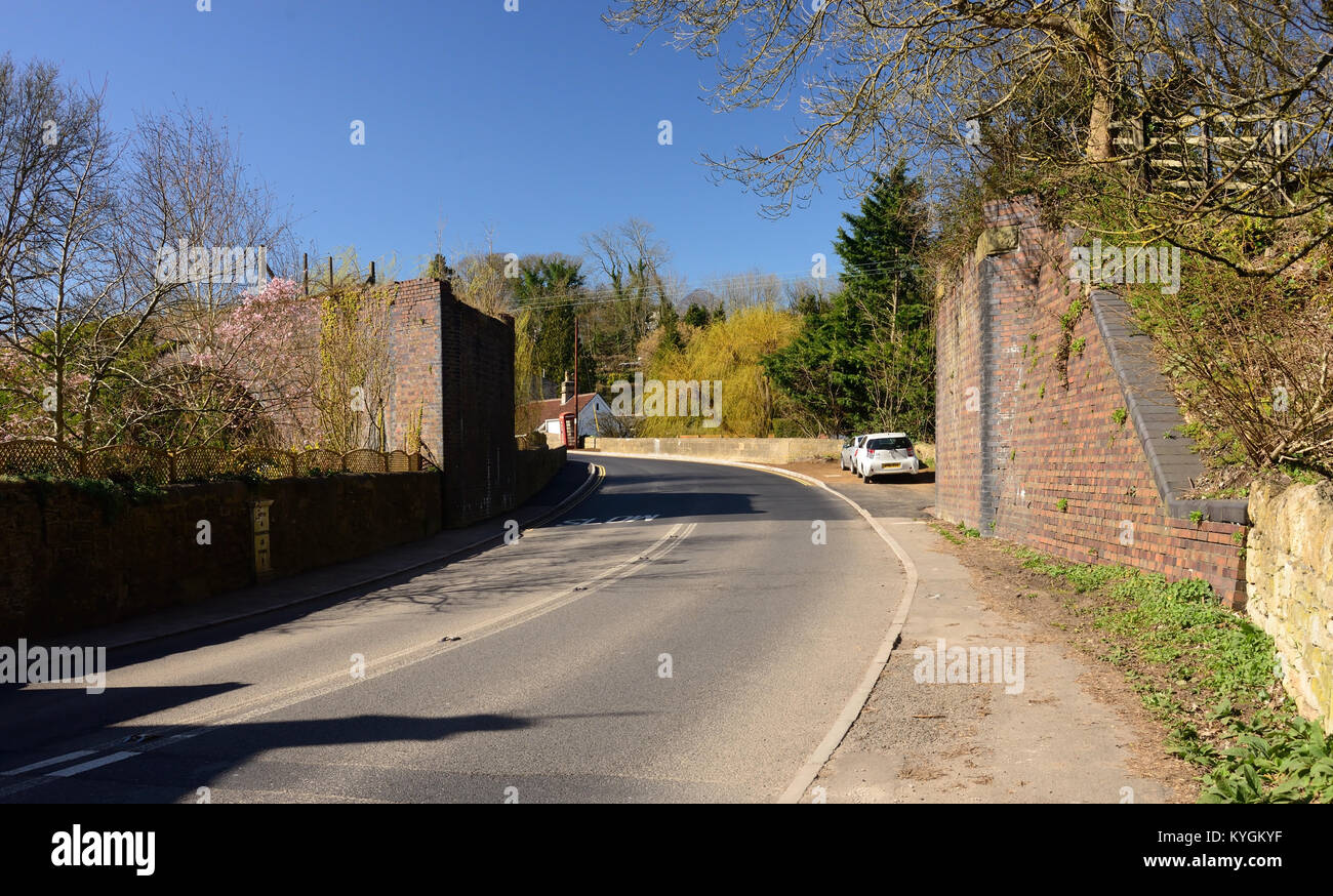 The B3110 road through Midford passes between the surviving piers of a ...