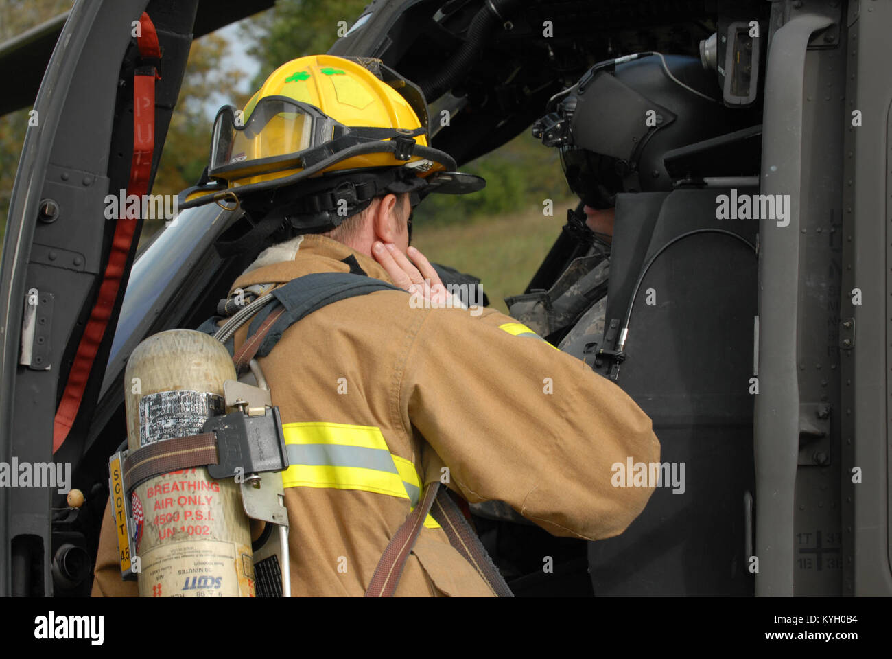 Frankfort Firefighter Jon Lawson medically evaluates Kentucky Guardsman ...