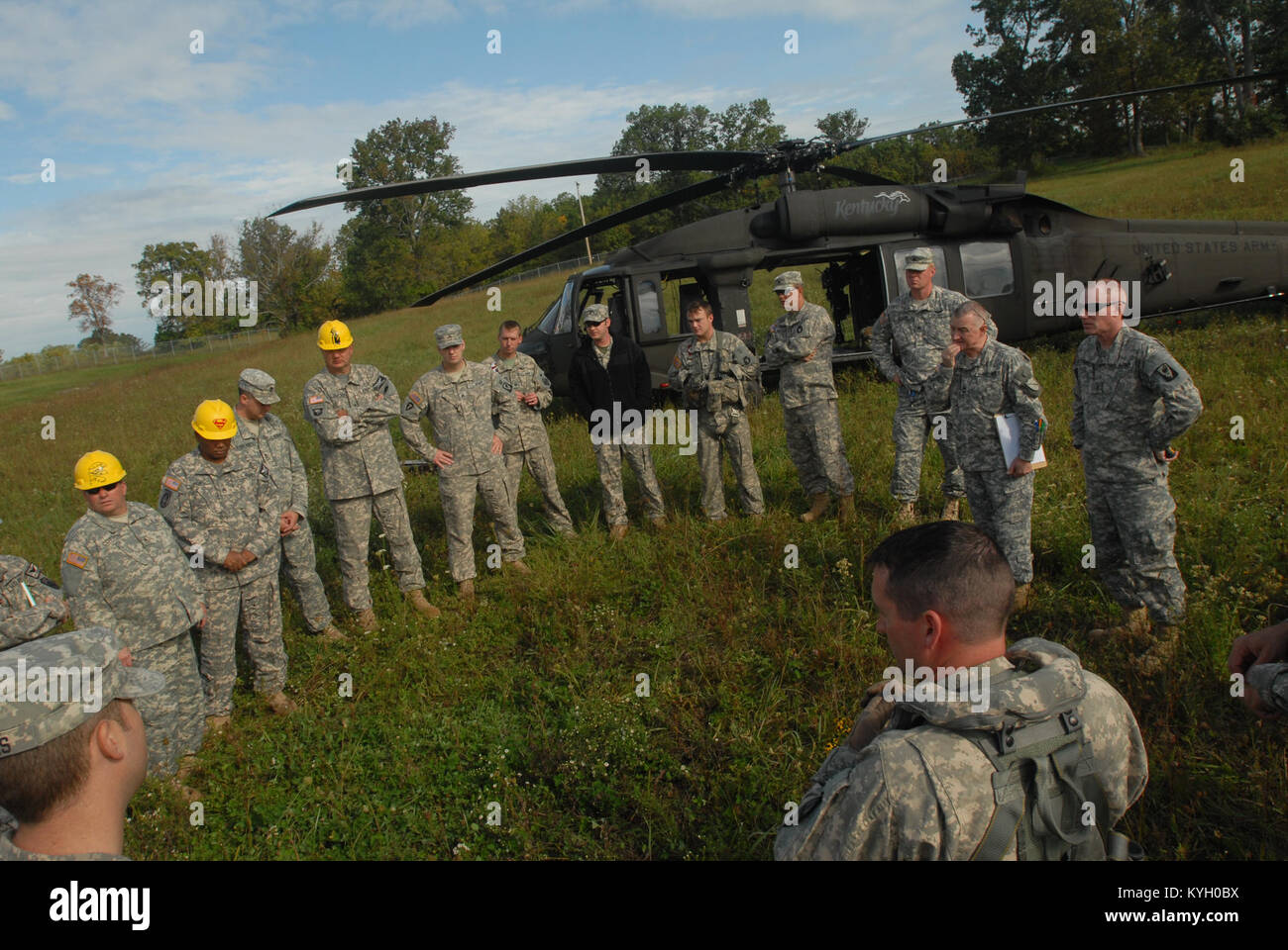 Kentucky Guardsmen of the Army Aviation Support Facility discuss after ...