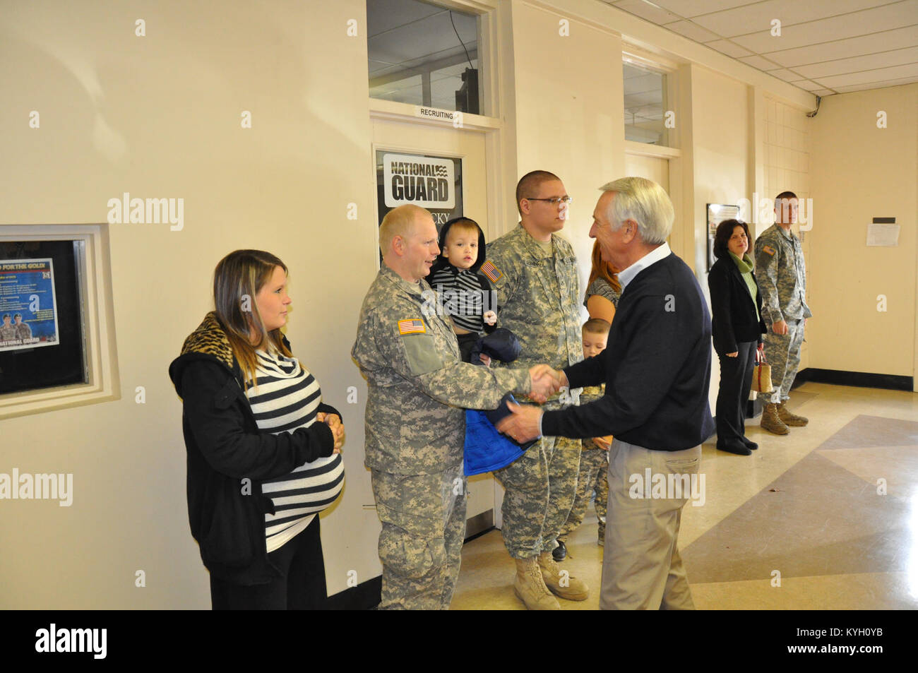 Governor Steve Beshear is greeted by Spc. Richard A. Johnson, who is a ...