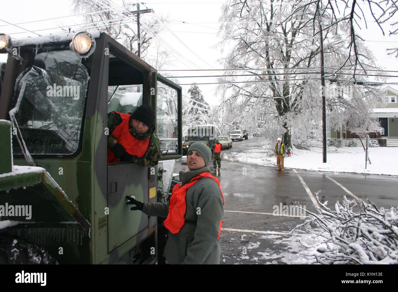 Soldiers from A Co. 103rd Brigade Support Battalion cut down trees ...