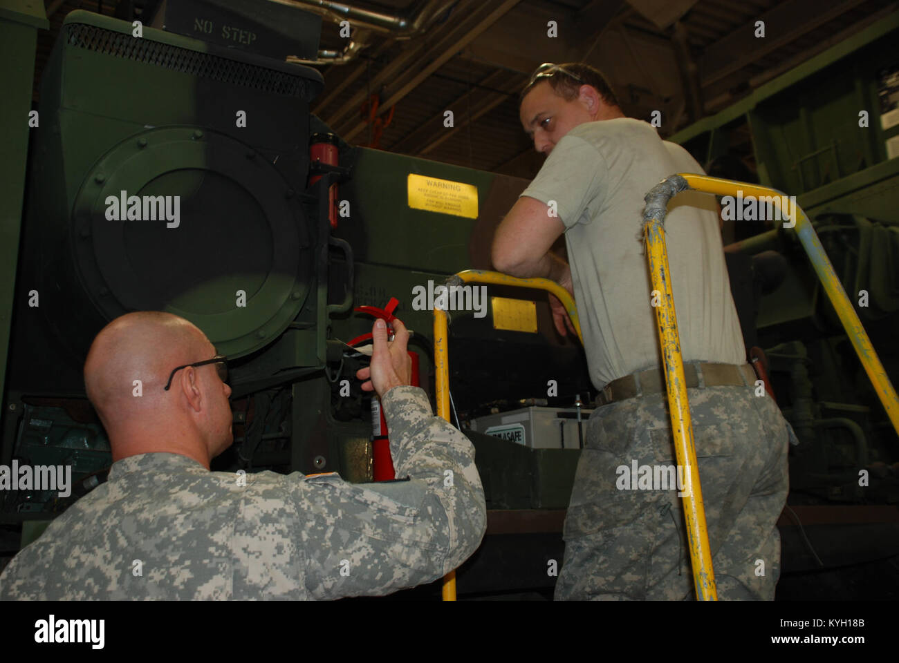 Chief Warrant Officer Two Mark Strunk and Staff Sgt. Robert Peaveler ...