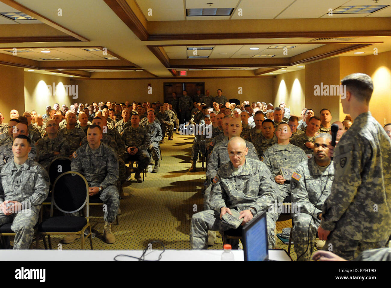 Members of the 149th Maneuver Enhancement Brigade gather for a break ...