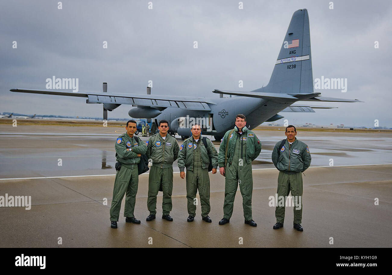 Members of the Ecuador Air Force walk out to a Kentucky Air Guard C-130 ...