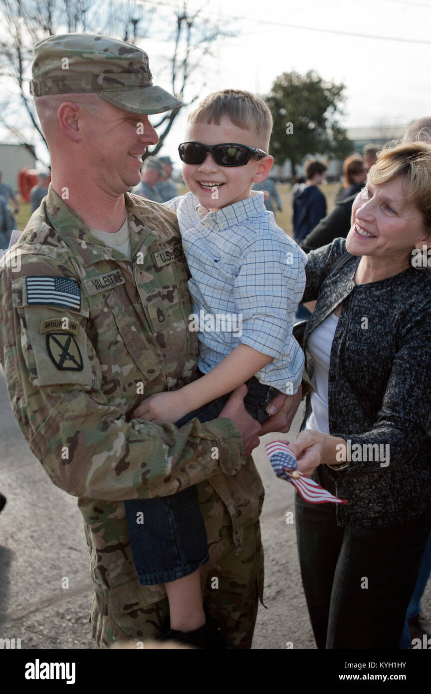 Staff Sgt. Jeff Valentine greets his son for the first time in nine ...