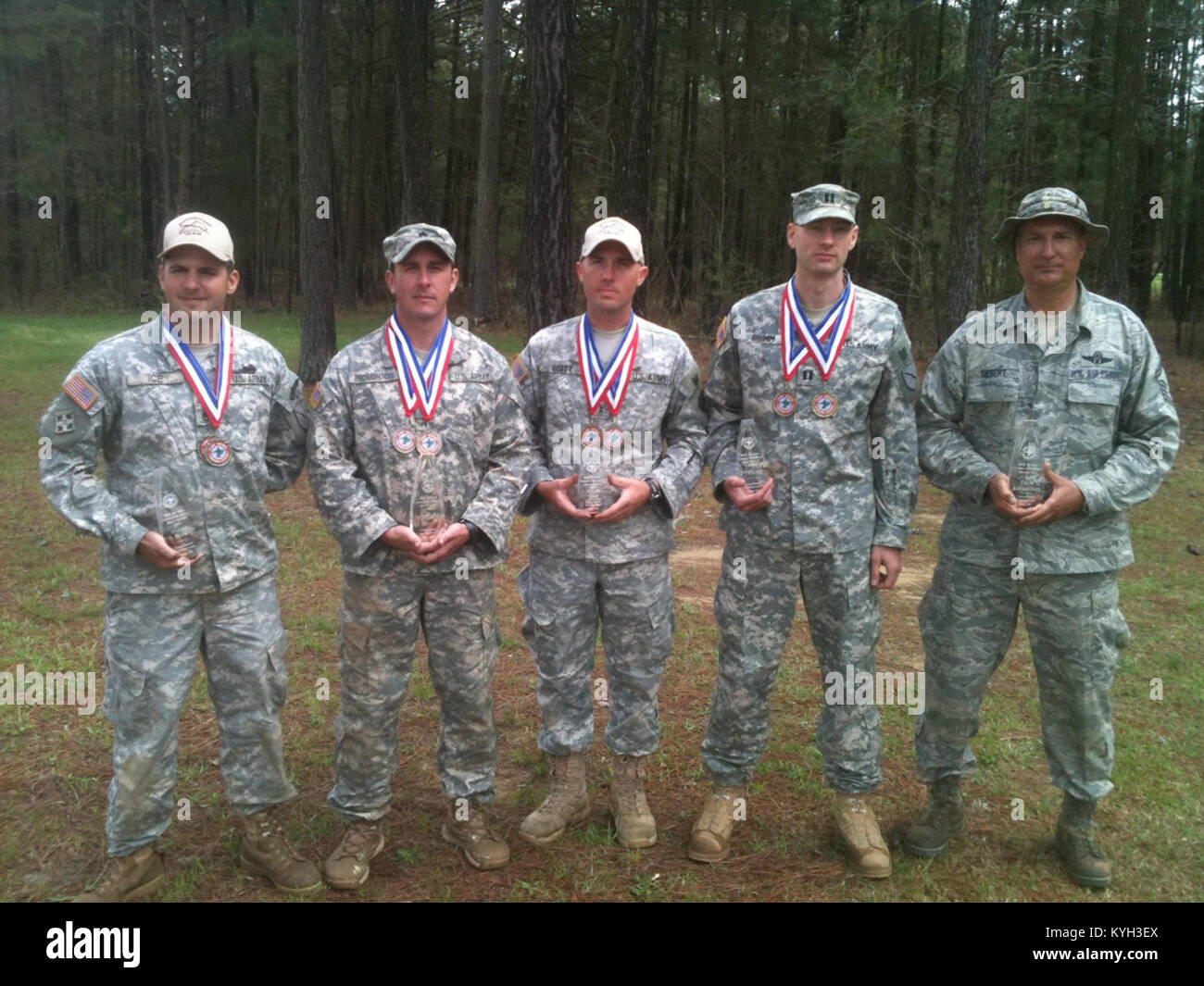 A team: Staff Sgt. Jeff Ice, Sgt. Ted Broughton, Chief Warrant Officer ...