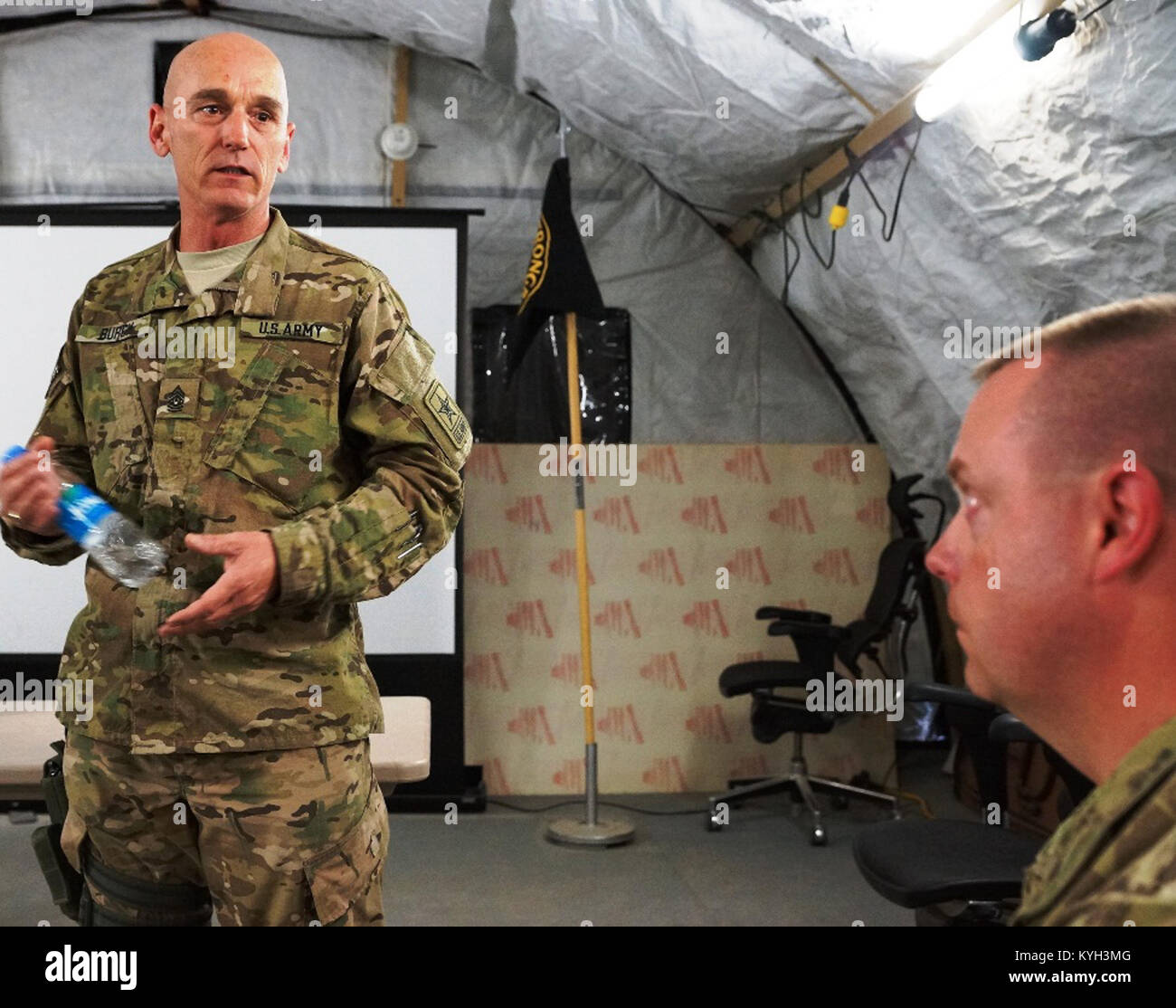 Command Sgt. Maj. Richard J. Burch speaks to the audience during a ...