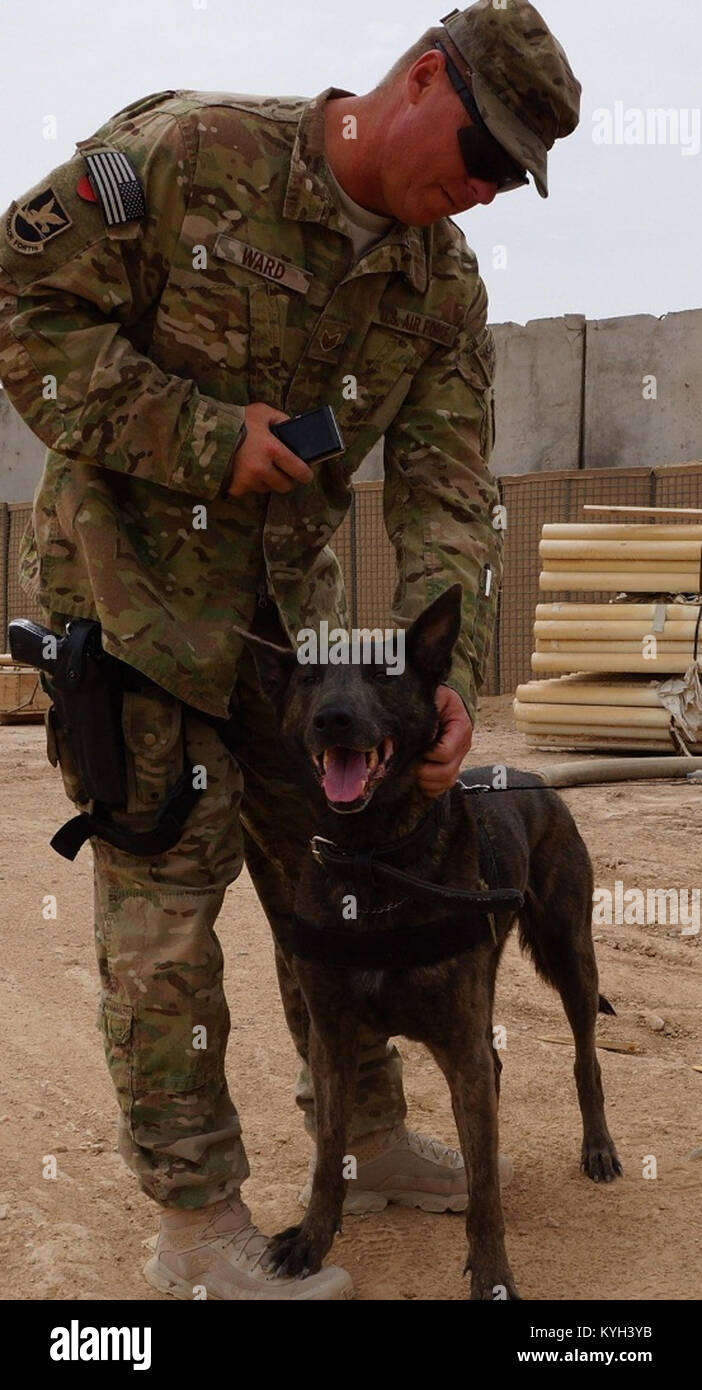 Staff Sgt. Jeff Ward of Georgetown, Ky. says hello to George, a ...