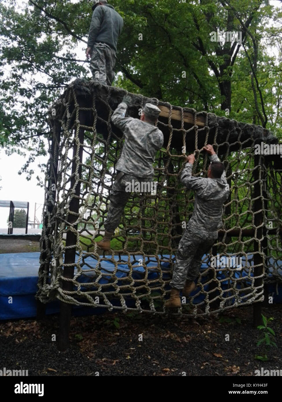 Spc. Jason Dunmire and Staff Sgt. Richard Cummins take on the climbing ...