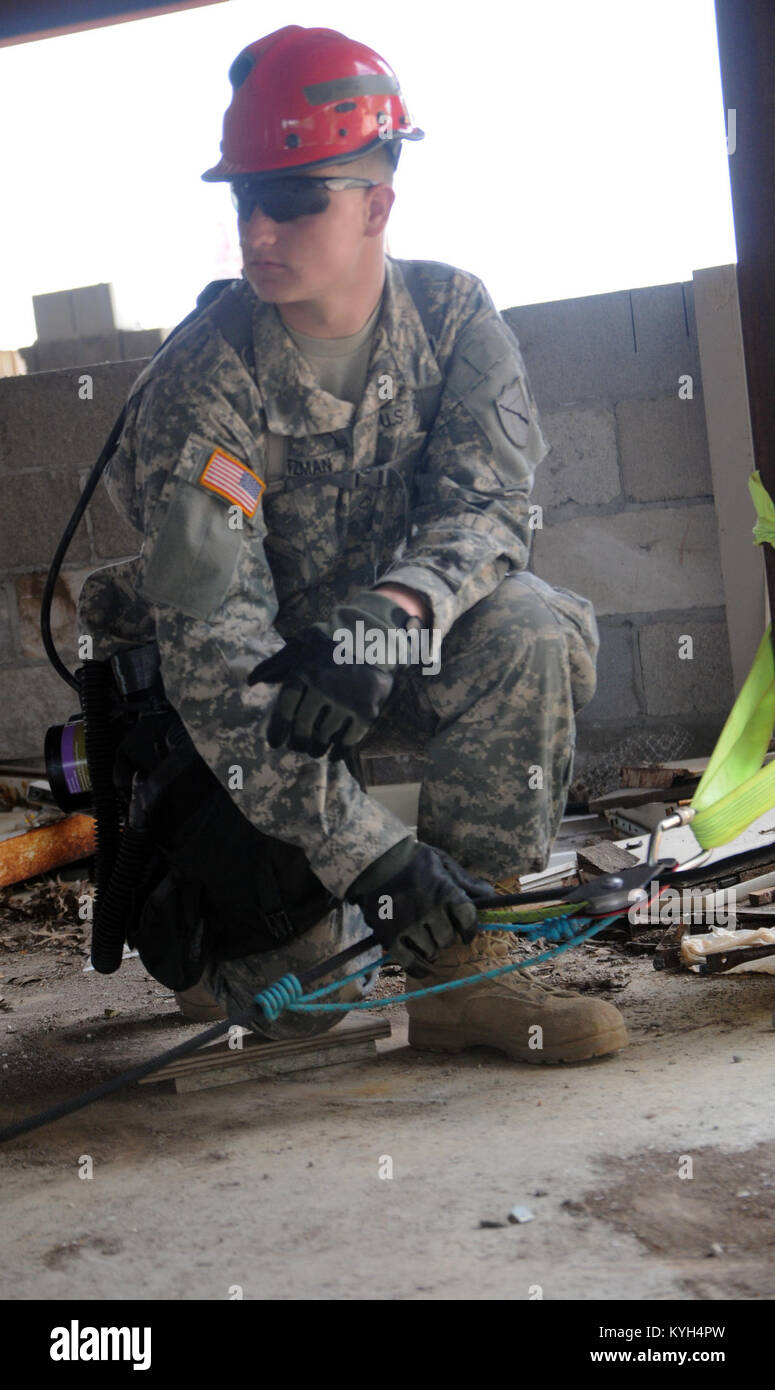 Kentucky Guardsman Pvt. 1st Class James Weitzman, a chemcial operations ...