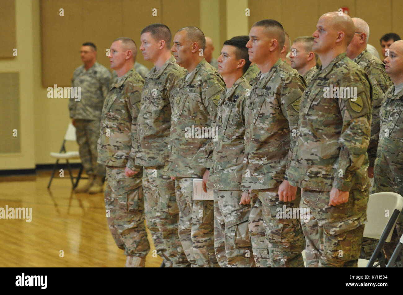 Soldiers of the 613th Engineer Facilities Detachment stand at attention ...