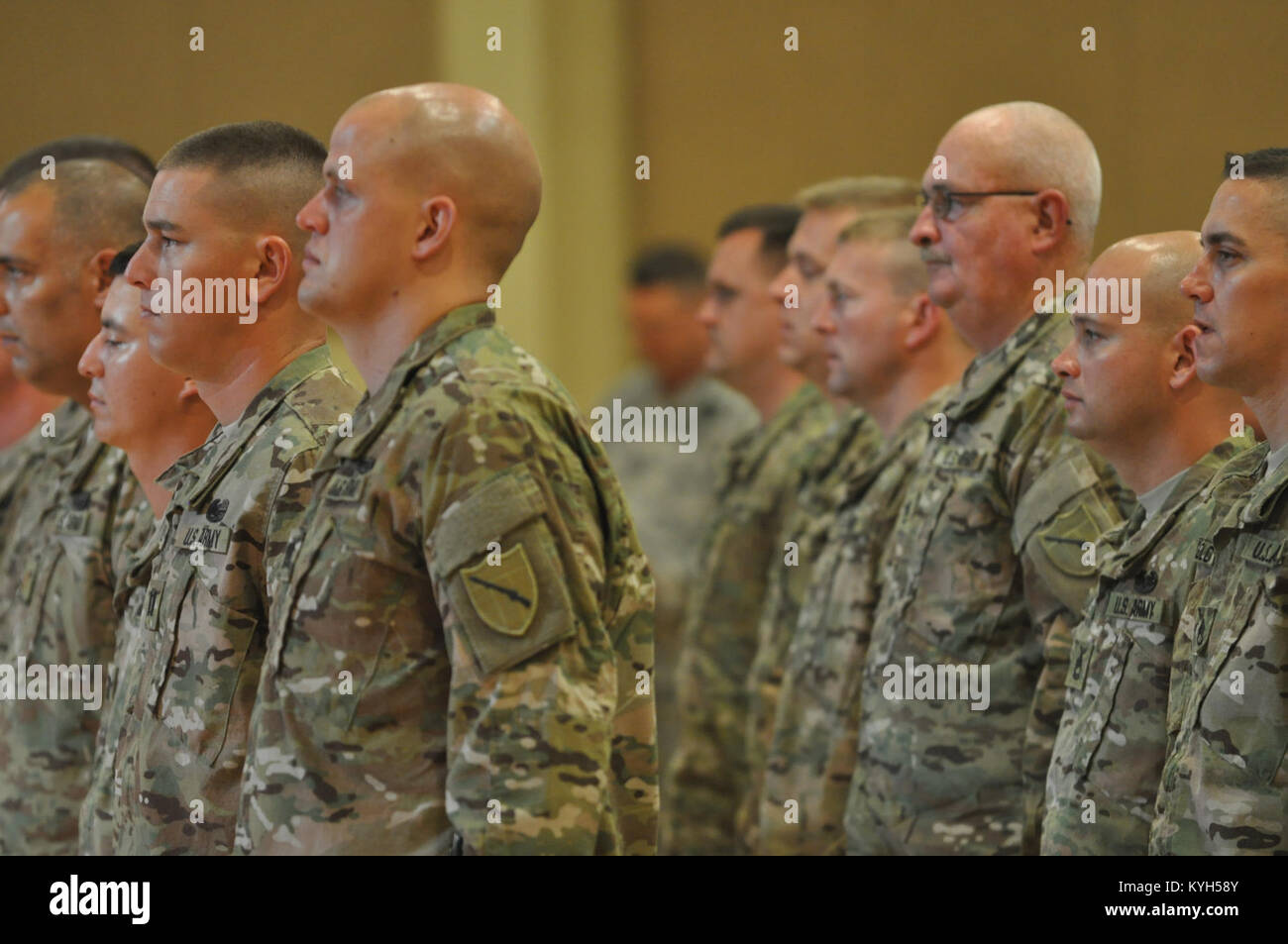 Soldiers of the 613th Engineer Facilities Detachment stand at attention ...