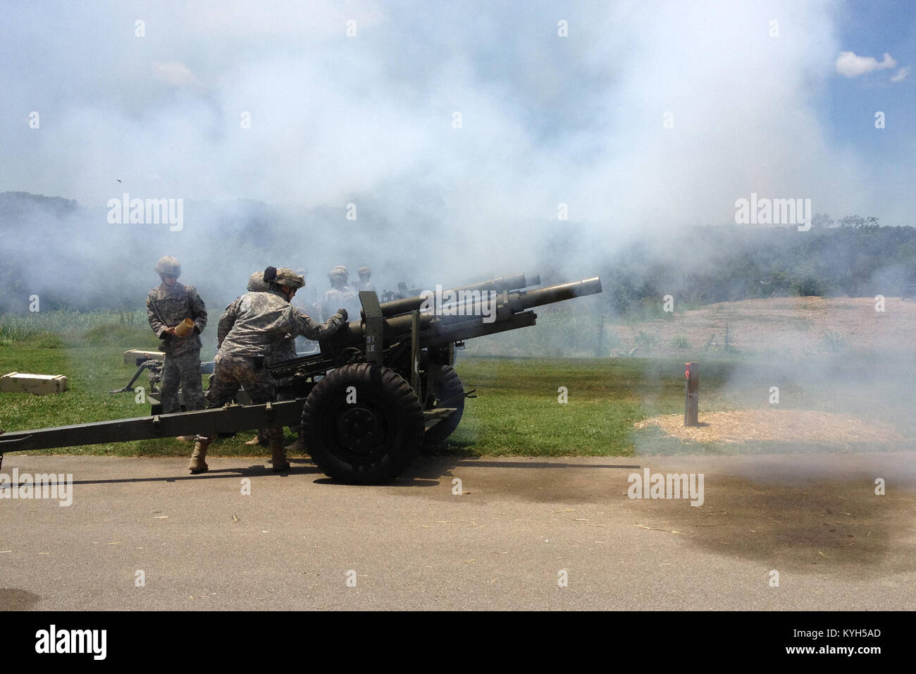 Soldiers of Charlie Battery, 623rd Artillery fire their 105mm Howitzer ...