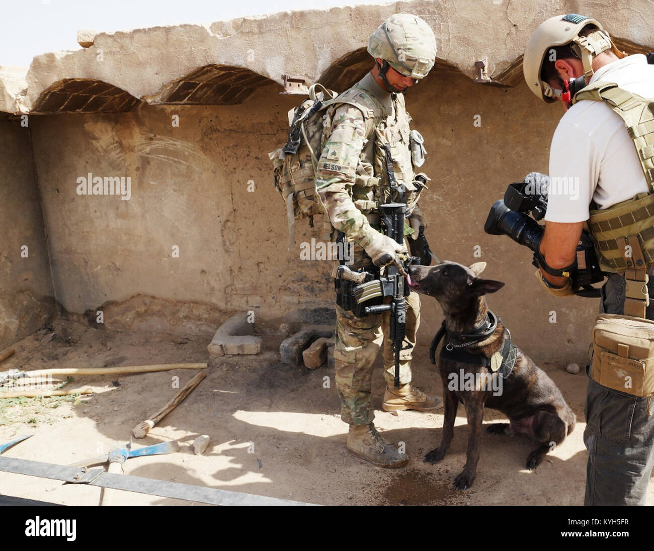 Sgt. Charles Nelson [left], a 27-year-old military working dog handler ...