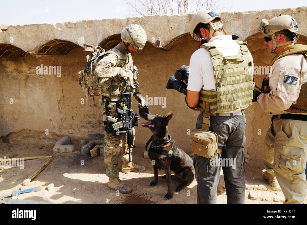 Sgt. Charles Nelson [left], a 27-year-old military working dog handler ...