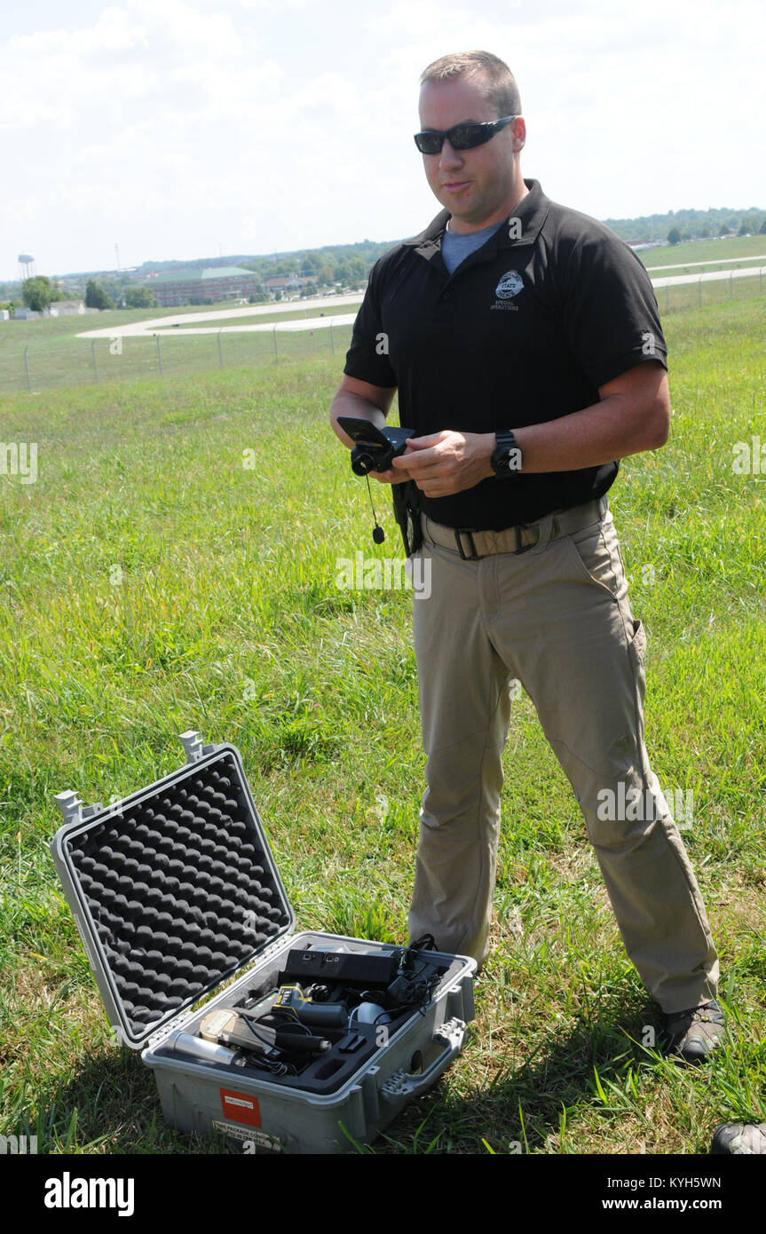 Jim Adkins with Kentucky State Police Special Operations demonstrates ...