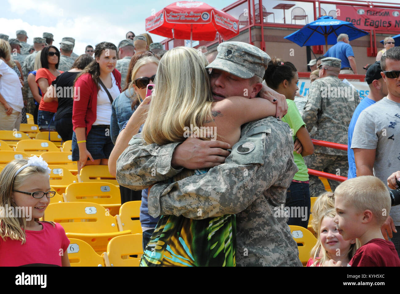 Spc. Daniel Morrison of the 1204th Aviation Support Battalion hugs ...