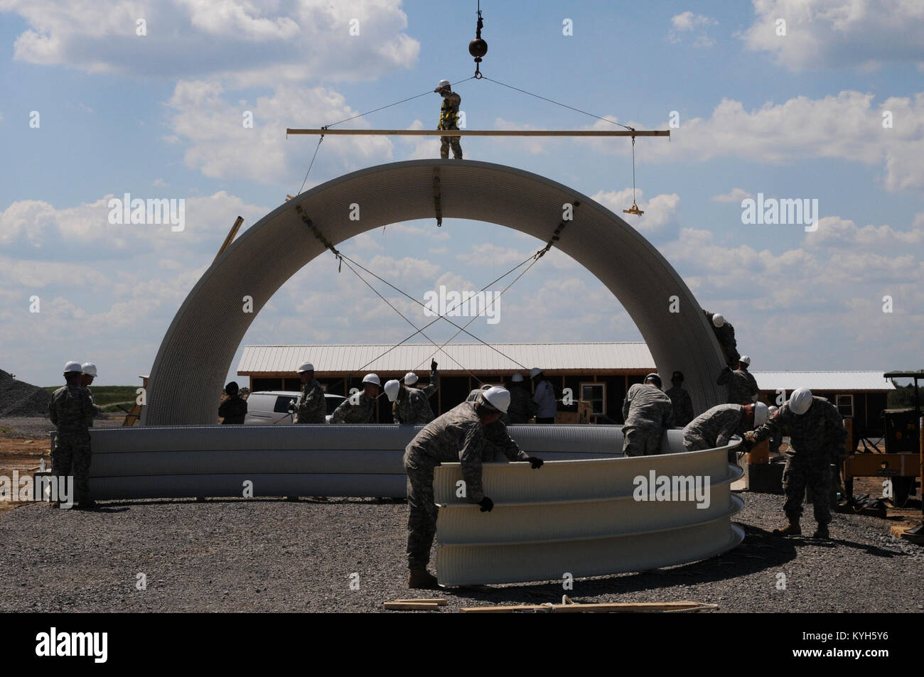 Soldiers of the 149th Vertical Engineer Co. assemble steel panels to ...