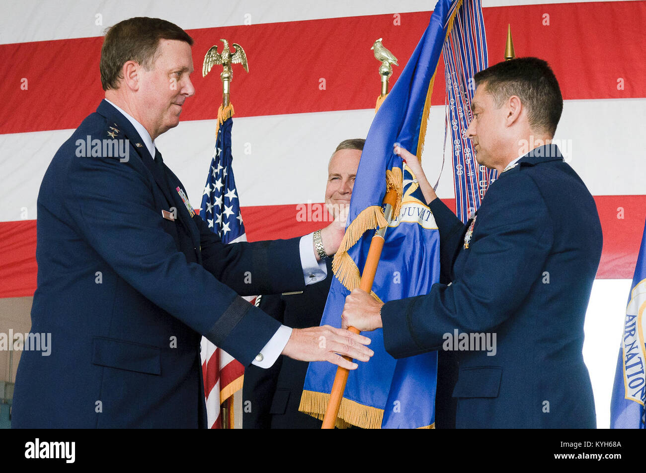 Col. Warren H. Hurst (right) accepts the guidon of the 123rd Airlift ...