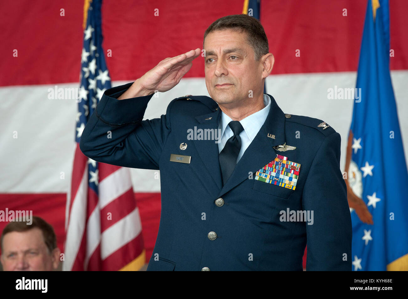 Col. Warren H. Hurst receives his first salute as commander of the ...