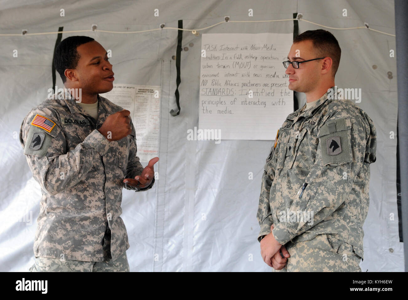 Army Spc. Tyler Douglas, a fire direction controller assigned to ...