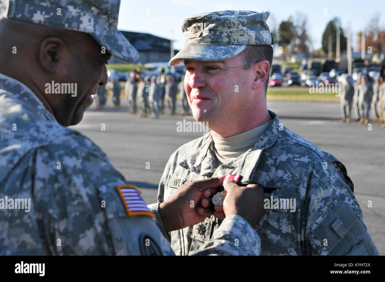 Kentucky Army National Guard Lt. Col. Brent A. Wilkins receives the ...