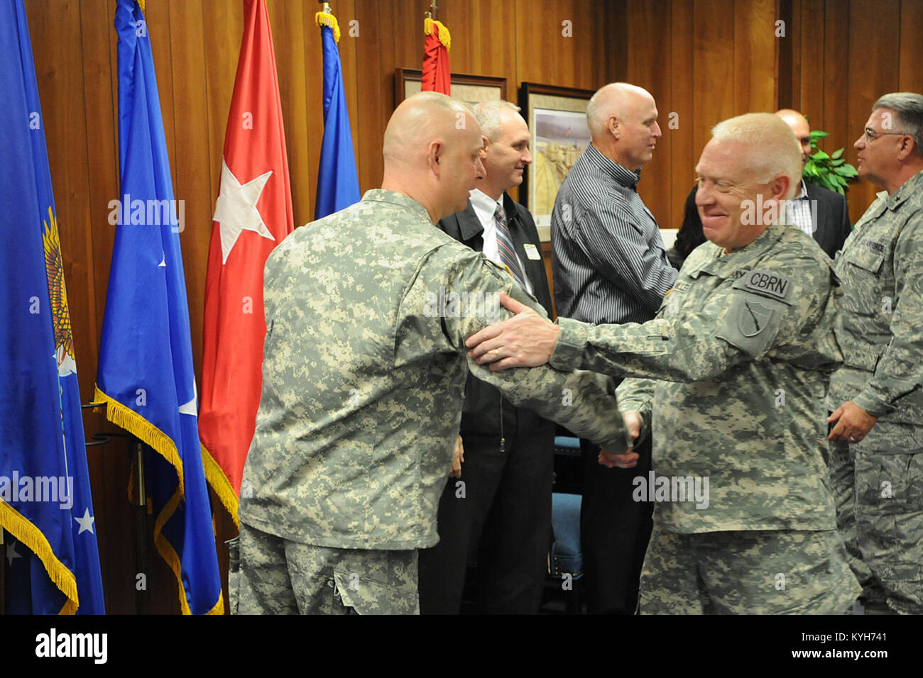 Maj. David Grebe is promoted to the rank of lieutenant colonel during a ...