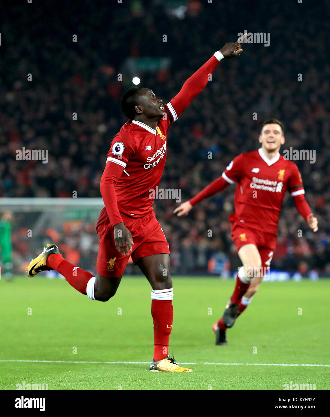 Liverpool's Sadio Mane celebrates scoring his side's third goal of the ...