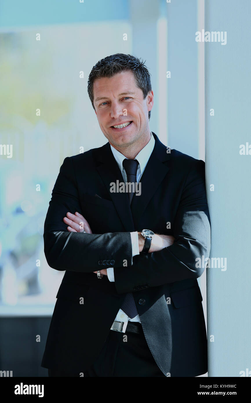 Portrait of a handsome business man Stock Photo - Alamy