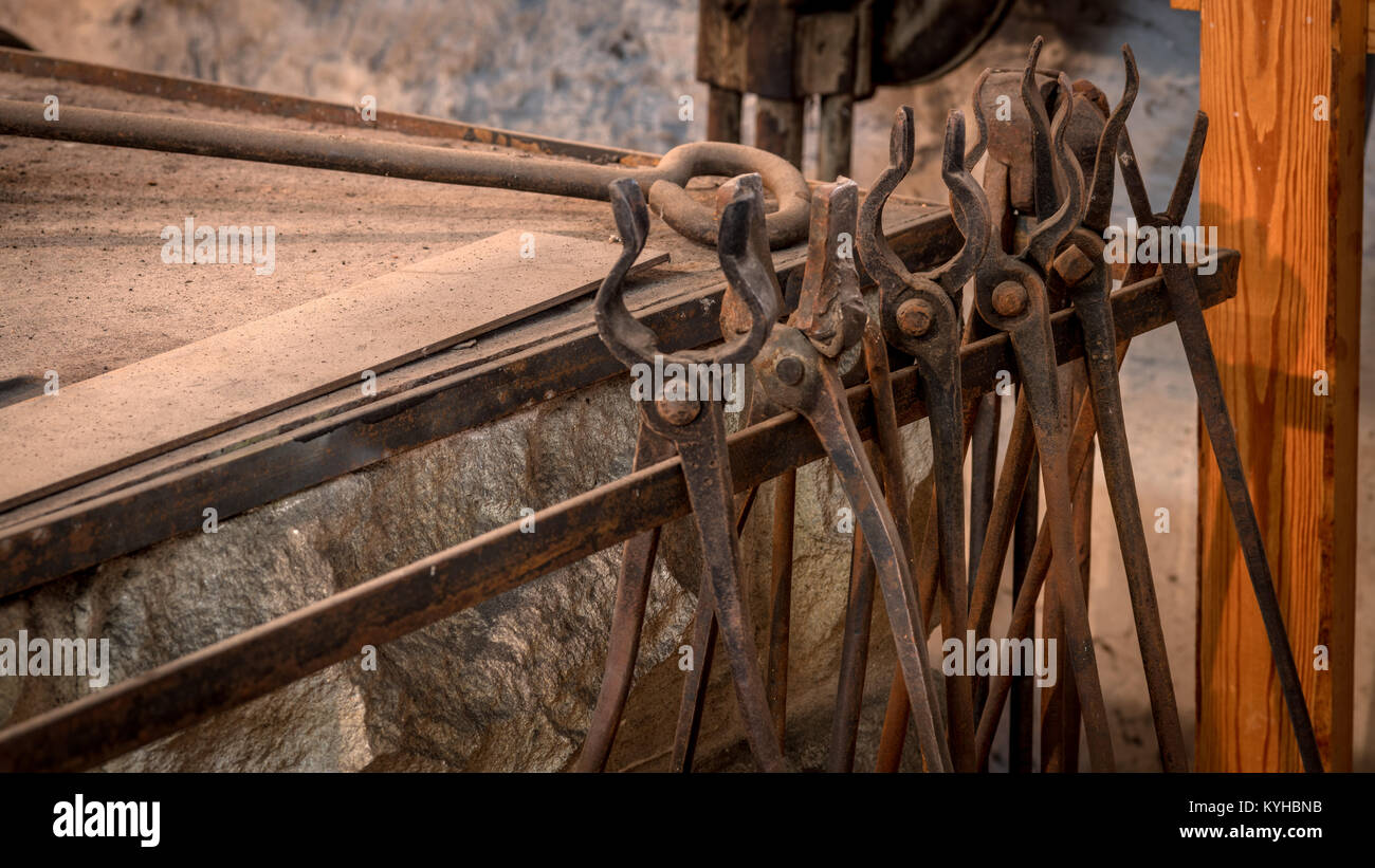 Antique metal workers tools in an old shop Stock Photo - Alamy