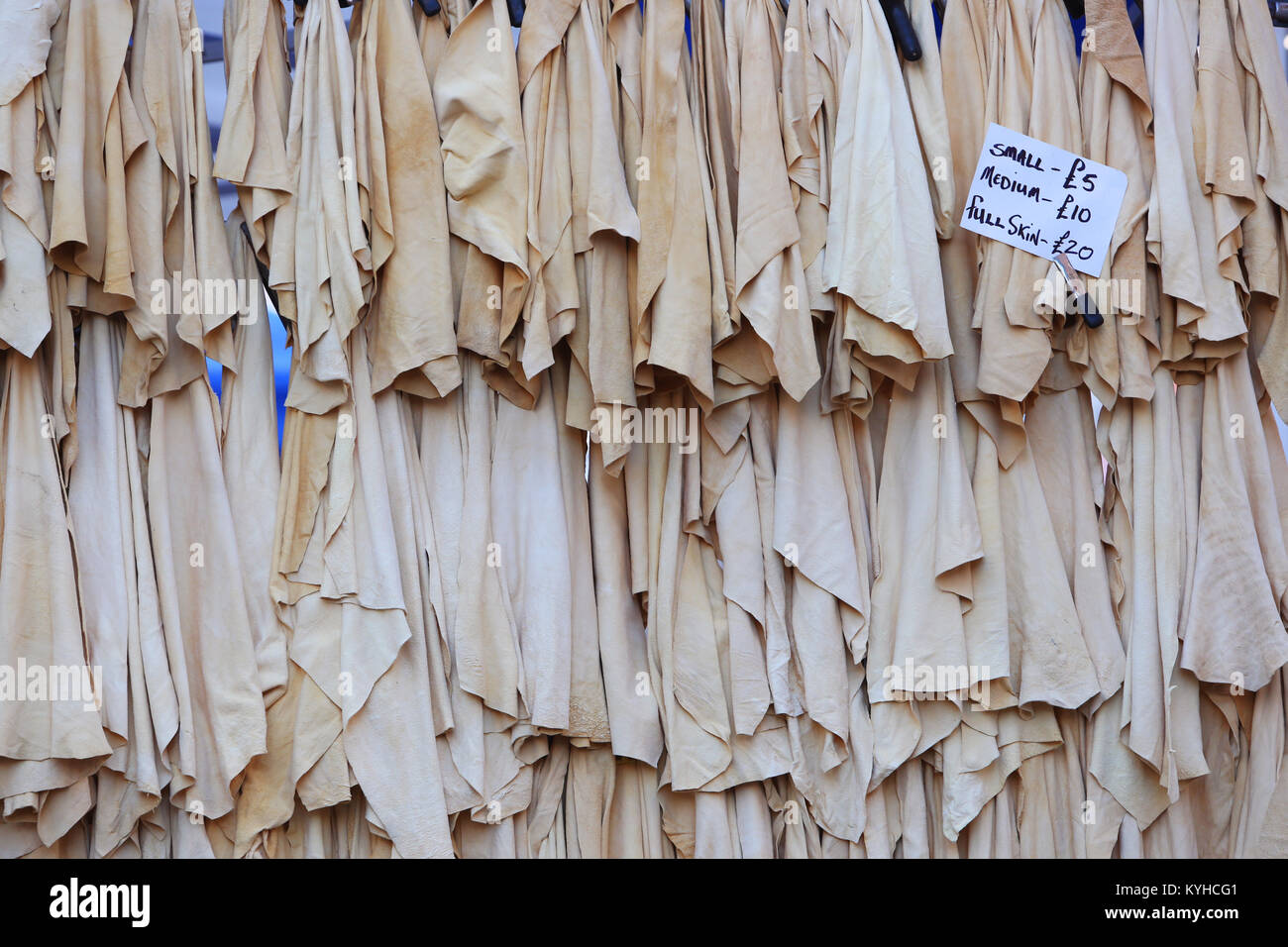 A selection of Chamois leathers or Shammy Leathers for sale on a market ...