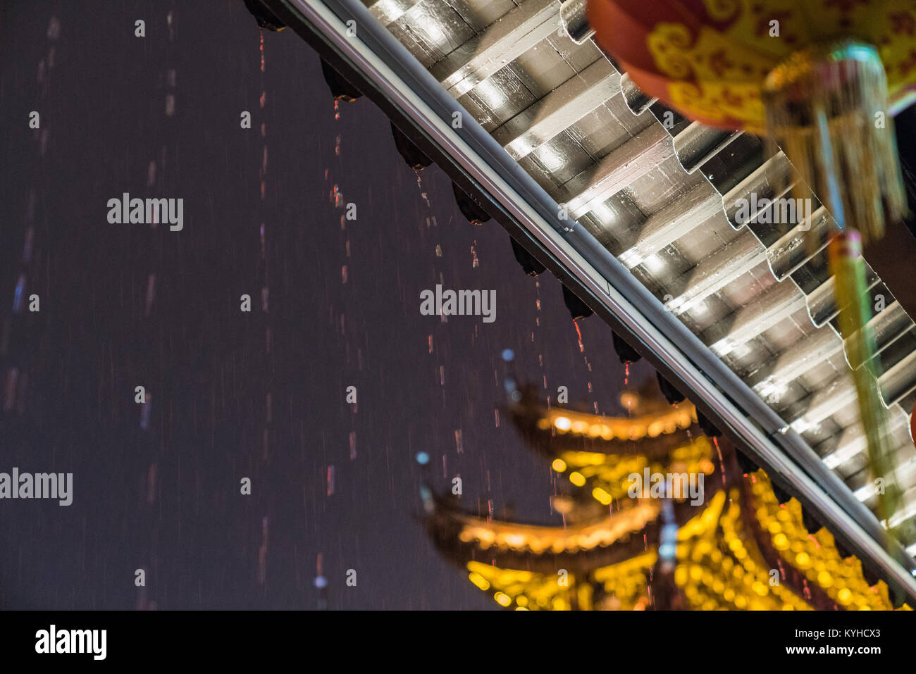 Rain Droplet from Eaves Stock Photo - Alamy