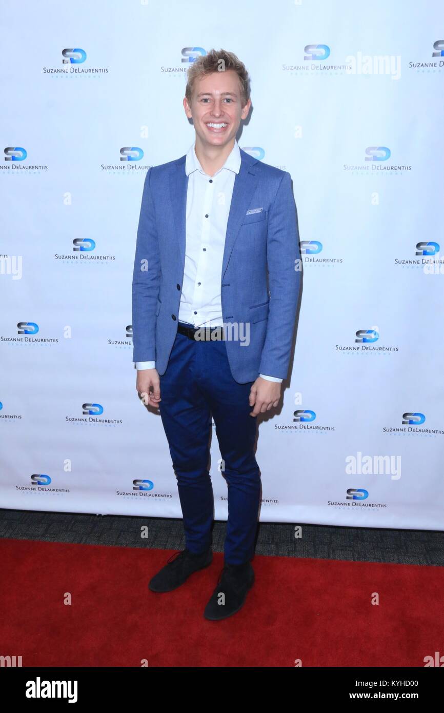 Suzanne DeLaurentiis Christmas Party - Arrivals Featuring: Logan Coffey ...