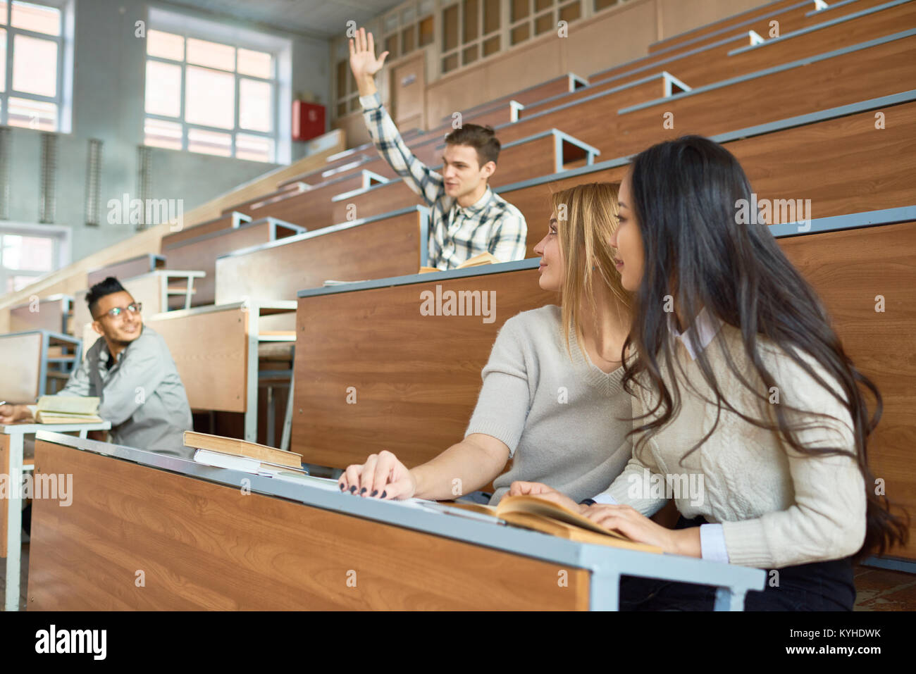 Beautiful girls sitting in row hi-res stock photography and images - Alamy