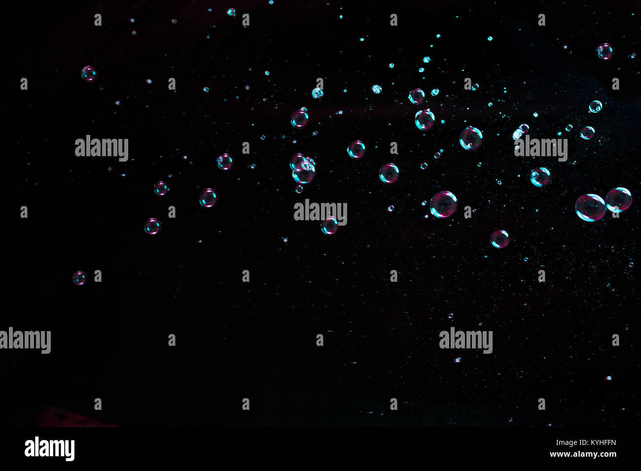 Bubbles on black background Stock Photo - Alamy