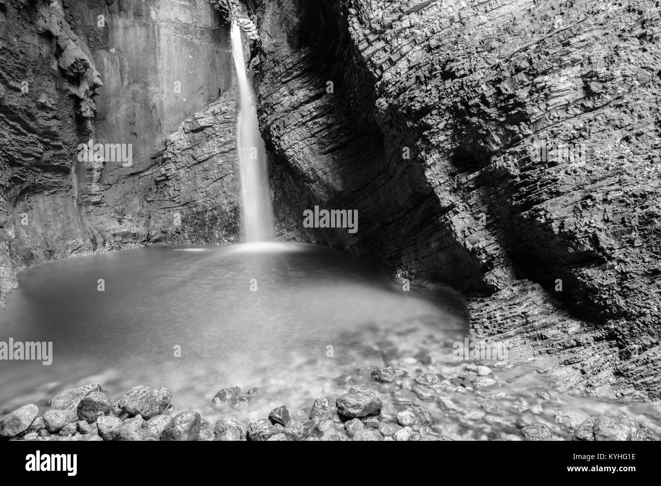Waterfall flowing turquoise pool Black and White Stock Photos & Images ...