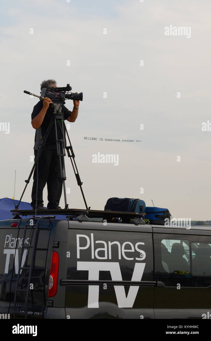Planes TV video cameraman covering the Shoreham Airshow atop a van with ...