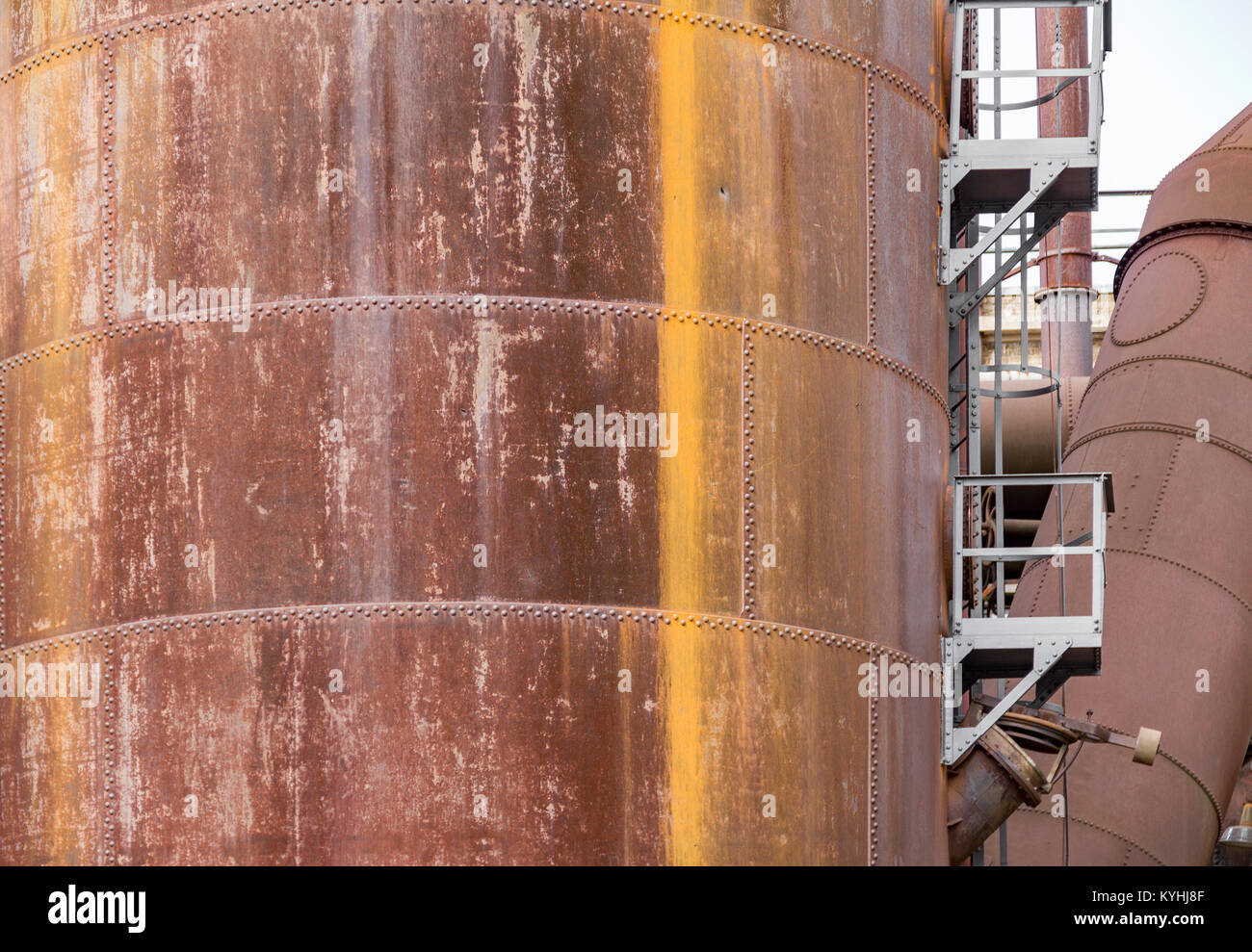 weathered rusty industrial scenery with old corroded steel girders and ...