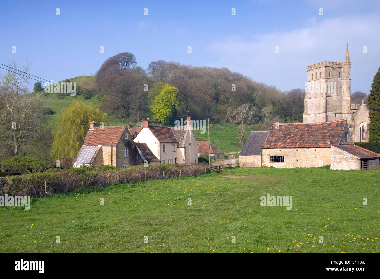 The small idyllic rural Cotswold hamlet of Hawkesbury dwarfed by its ...