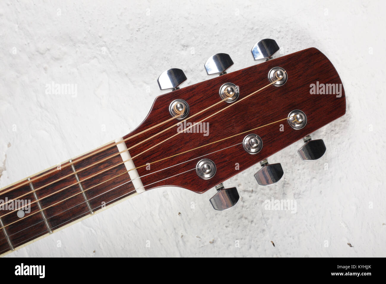 Musical instrument - Neck acoustic guitar on a white brick wall ...