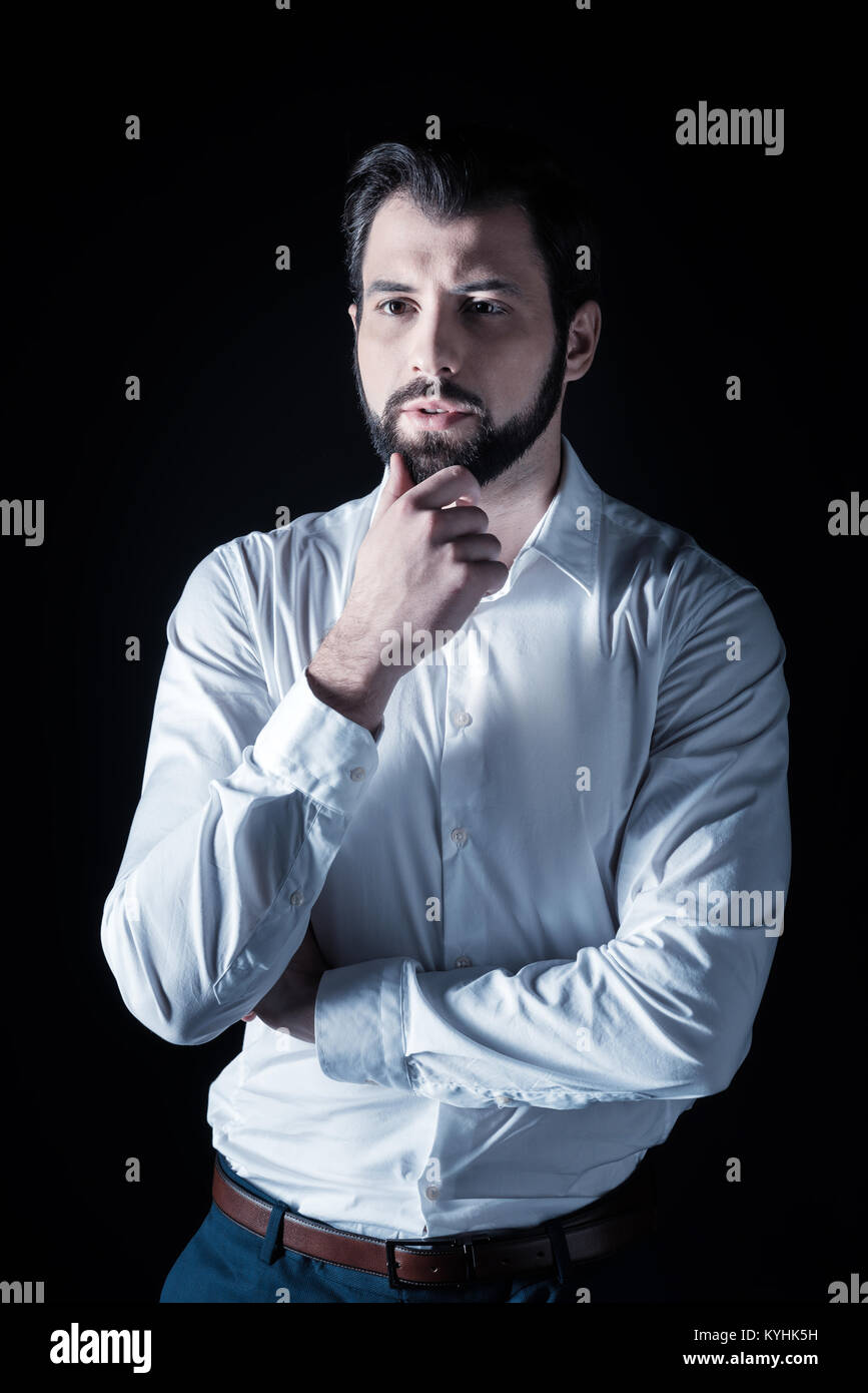 Handsome pensive man thinking Stock Photo - Alamy