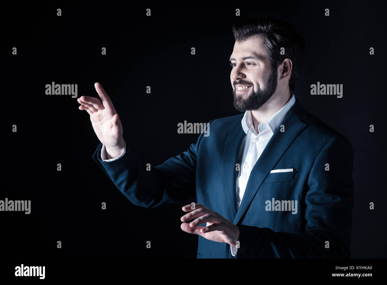 Happy professional businessman using modern technology Stock Photo - Alamy