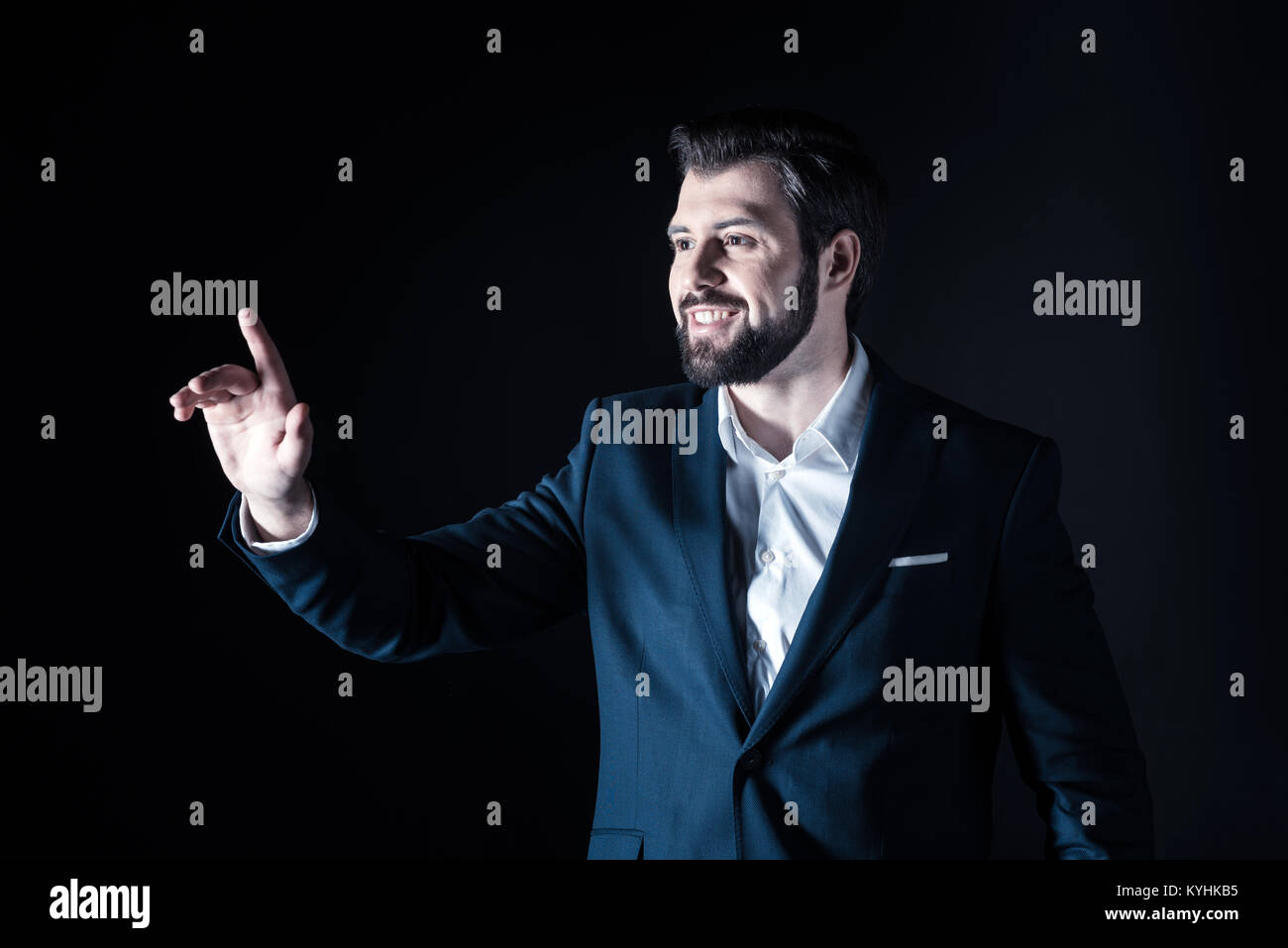 Happy joyful businessman enjoying modern technology Stock Photo - Alamy