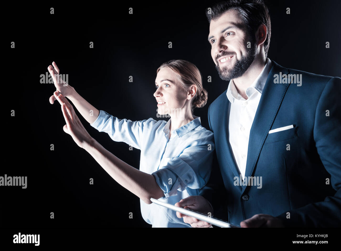 Positive nice people looking into the future Stock Photo - Alamy