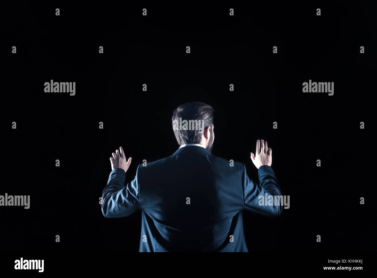 Smart confident businessman focusing on his work Stock Photo - Alamy