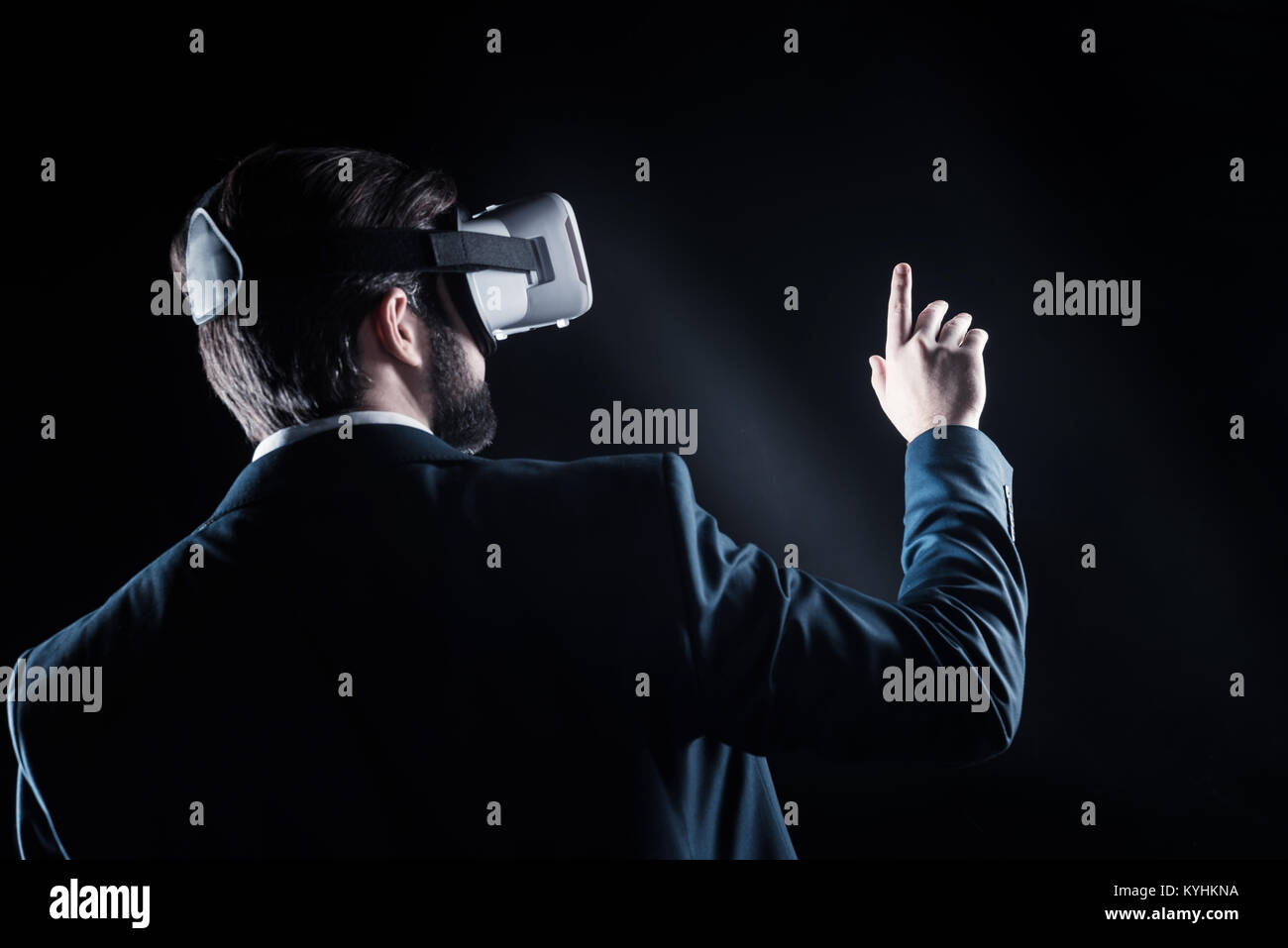 Nice smart businessman using 3d technology Stock Photo - Alamy